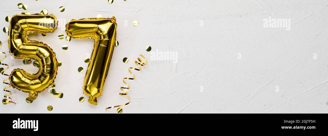 golden foil balloon number fifty seven. Birthday or anniversary card ...