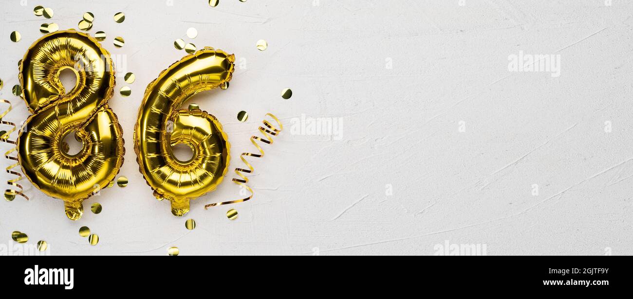 golden foil balloon number eighty six. Birthday or anniversary card ...