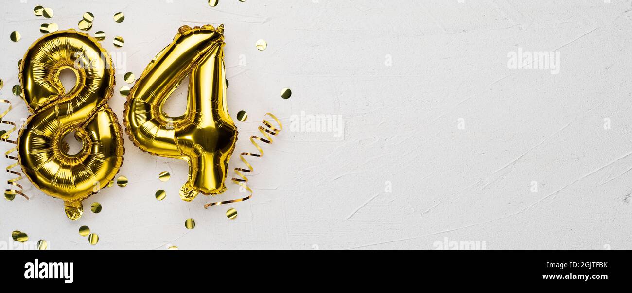 golden foil balloon number eighty four. Birthday or anniversary card ...