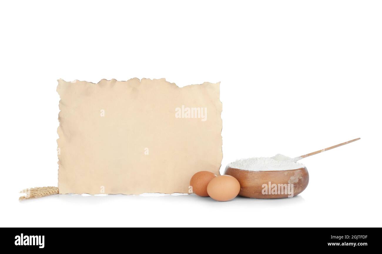 Bread recipe concept. Sheet of paper and ingredients on white ...