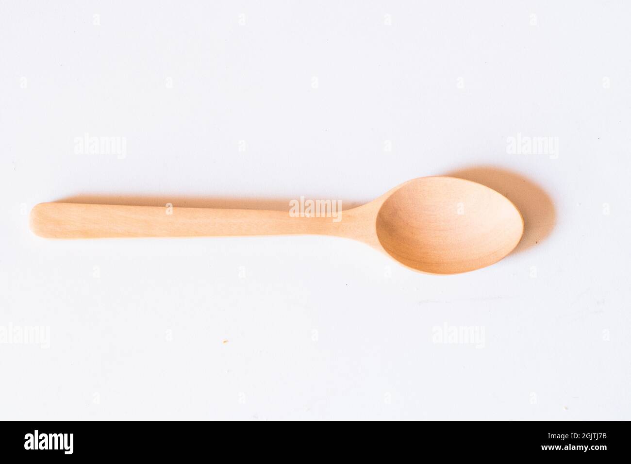 wooden spoon isolated on white background Stock Photo - Alamy