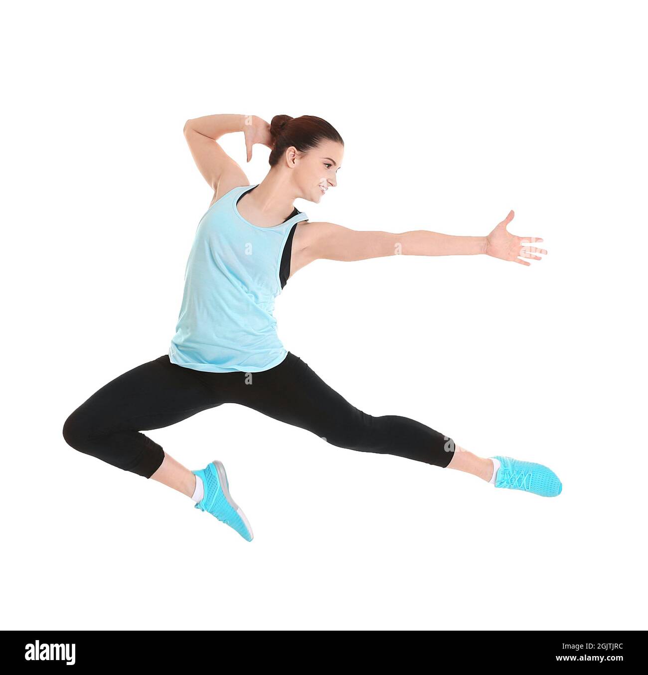 Young beautiful fitness girl training on white background Stock Photo ...