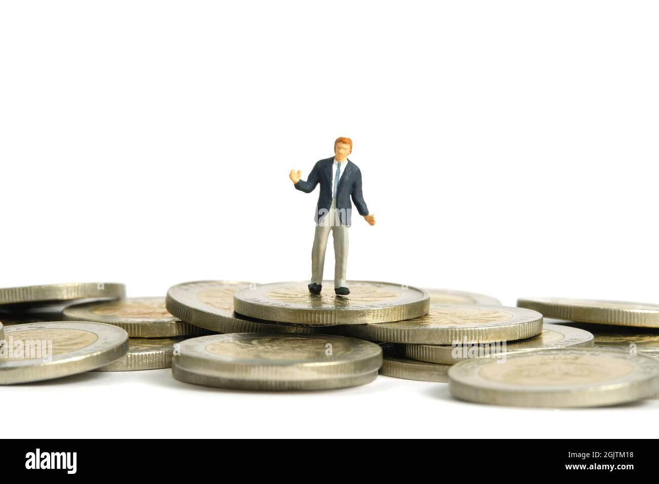 Miniature people toy figure photography. Financial plan concept. A ...
