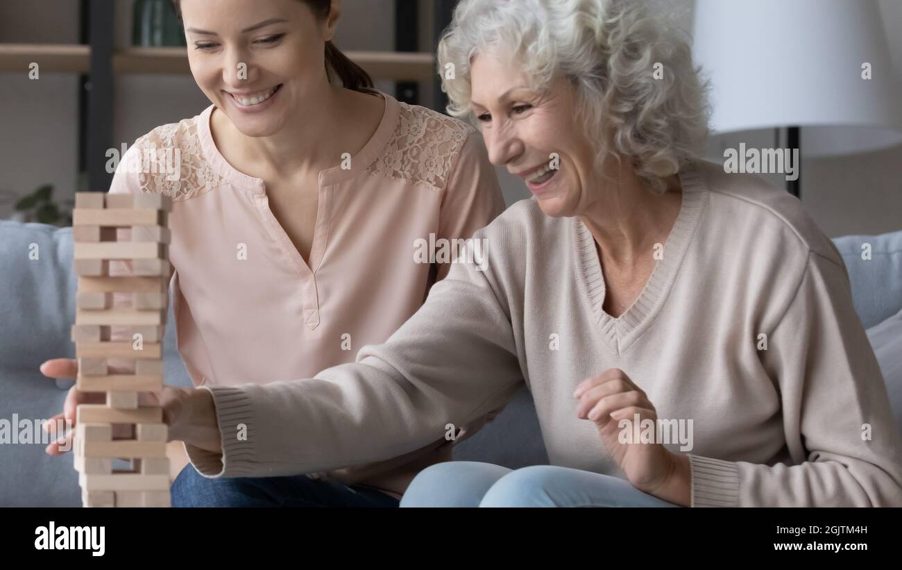 Happy two generations family having fun at home Stock Photo - Alamy