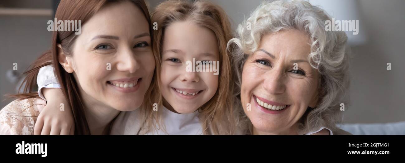 Bonding loving family posing together at home Stock Photo - Alamy