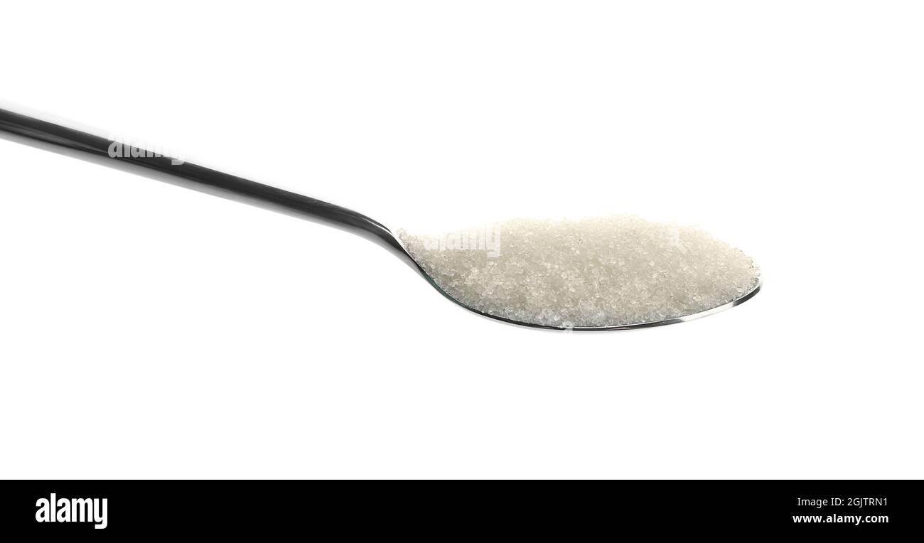 Sugar in spoon on white background Stock Photo - Alamy
