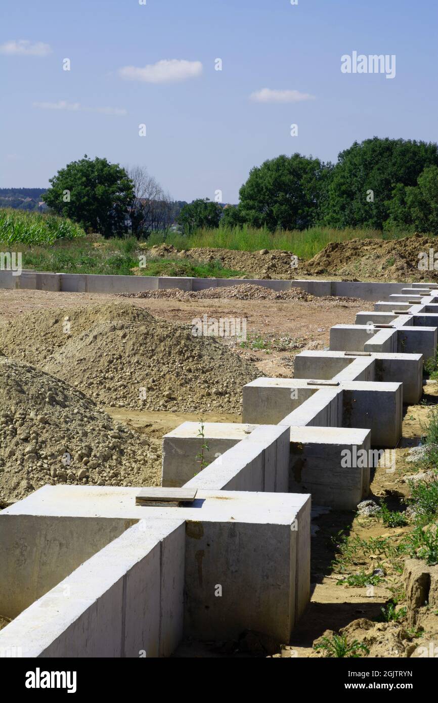 prefabricated columns of a warehouse under construction made of ...
