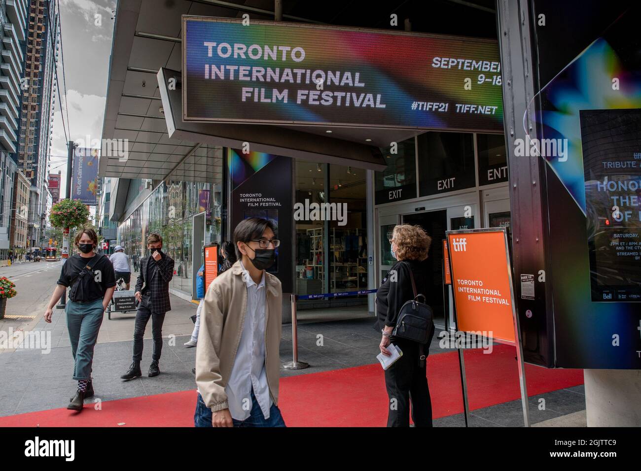 Toronto, Canada. 11th Sep, 2021. People walk past the TIFF Bell Light ...