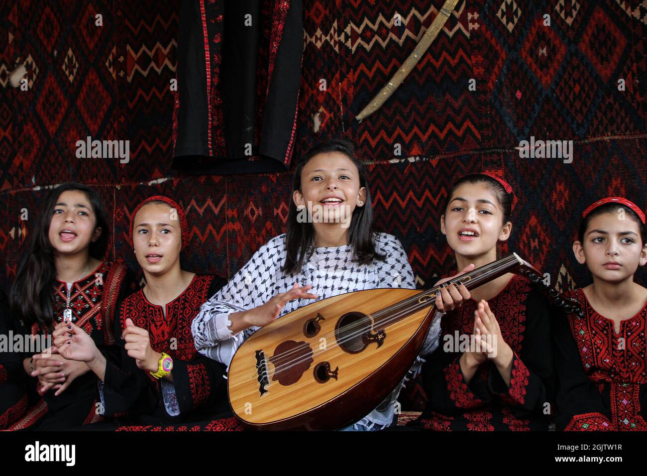 Gaza. 11th Sep, 2021. Children sing traditional songs as they ...