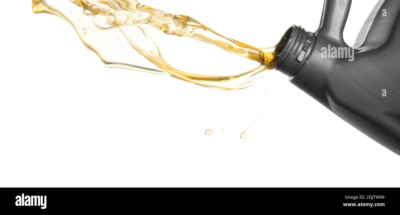 Engine oil pouring from canister, isolated on white Stock Photo - Alamy