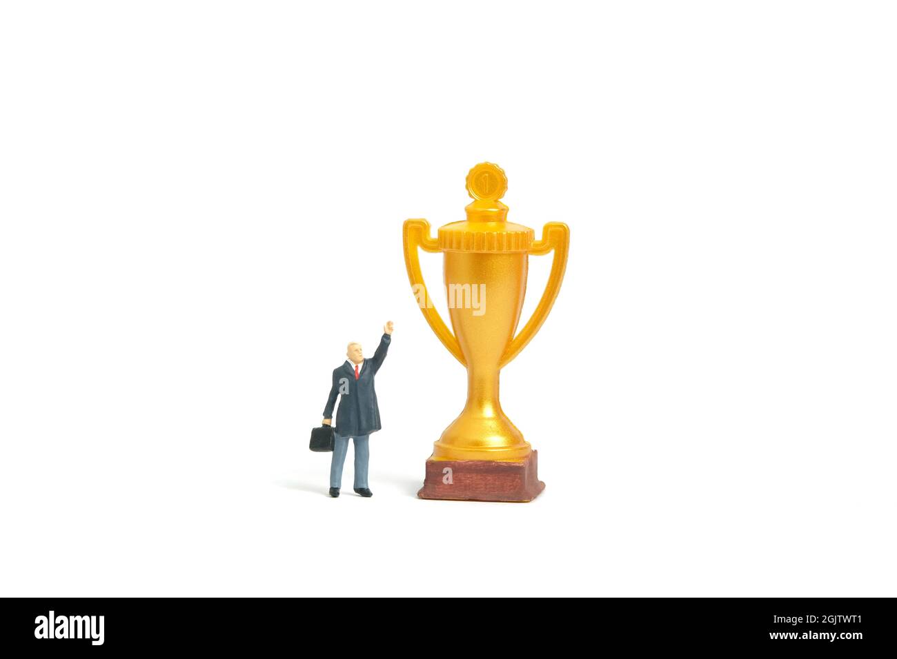 Miniature people toy figure photography. A businessman standing in ...