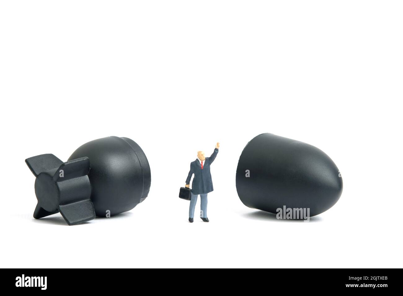 Miniature people toy figure photography. A businessman standing in the ...