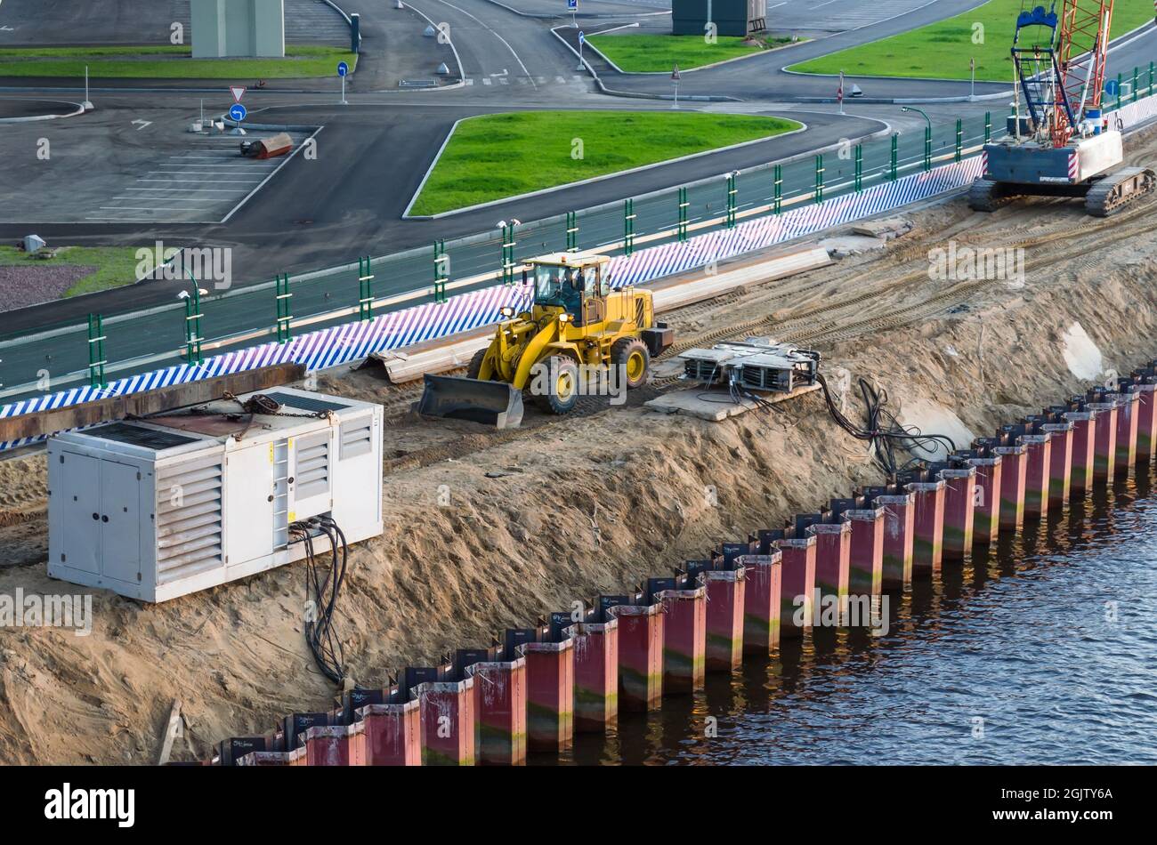 Construction of a waterfront on the beach Stock Photo - Alamy