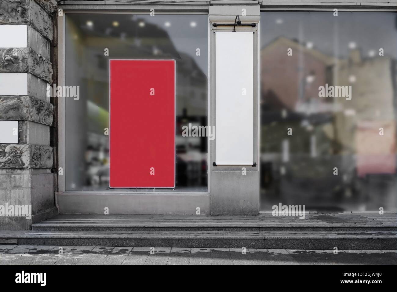 Shop window with sale banners Stock Photo - Alamy