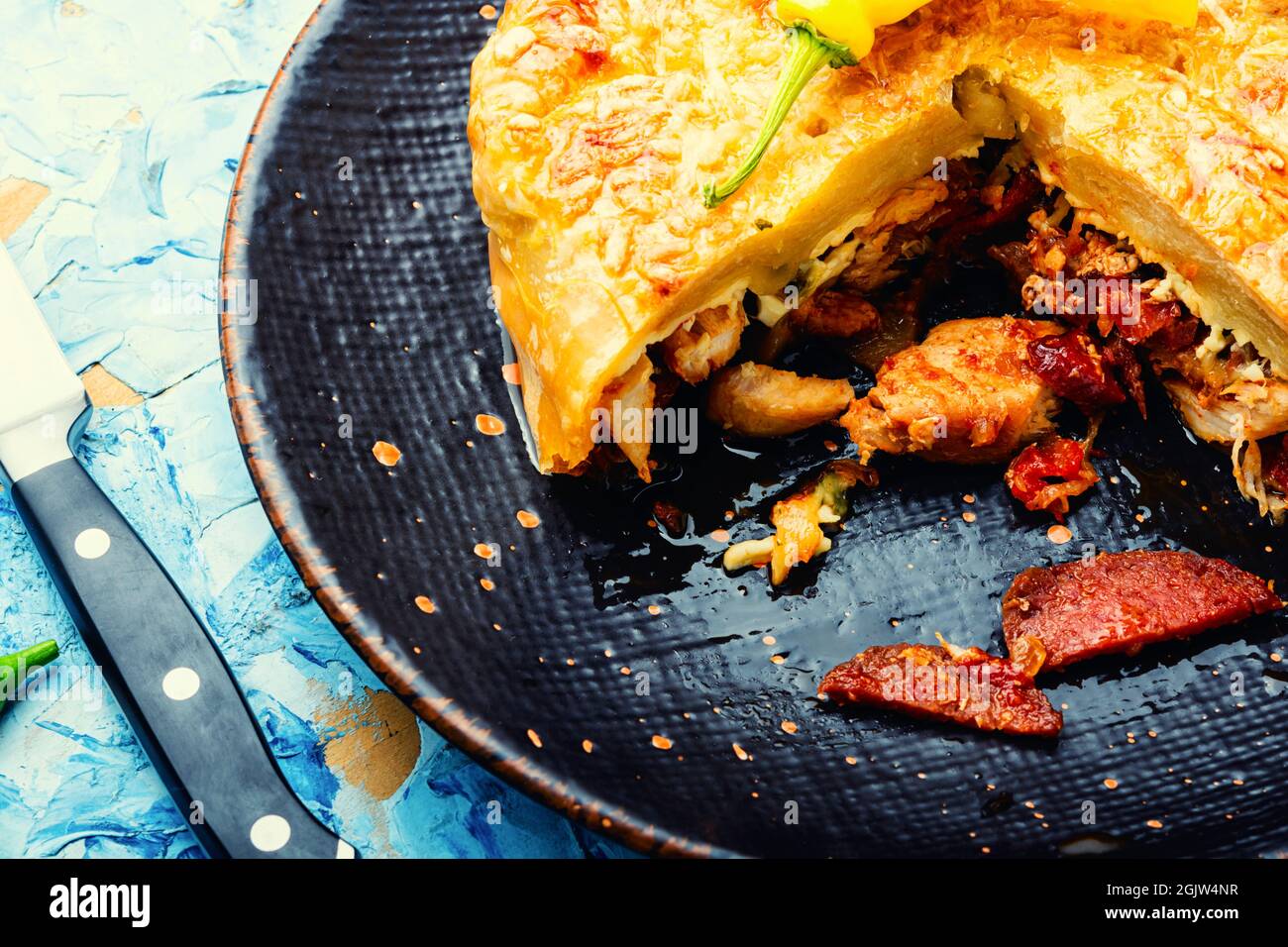 Mexican meat pie with sausage and chicken. Meat pie Stock Photo - Alamy