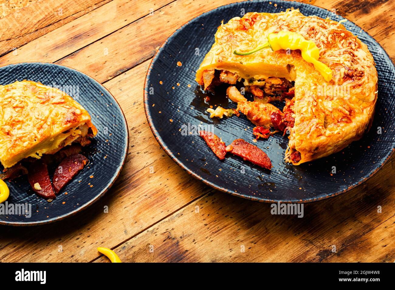 Mexican meat pie with sausage and chicken. Meat pie Stock Photo - Alamy
