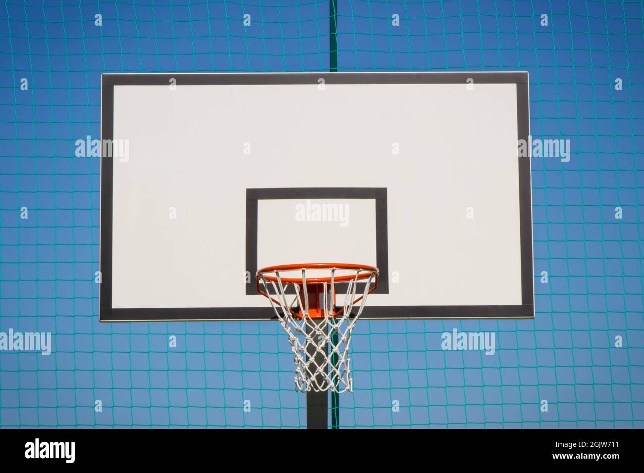 Basketball board with hoop on sky background. Sport and recreation time ...