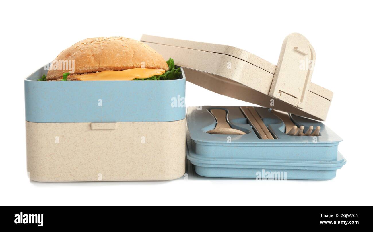 Open lunch box with hamburger on white background Stock Photo - Alamy