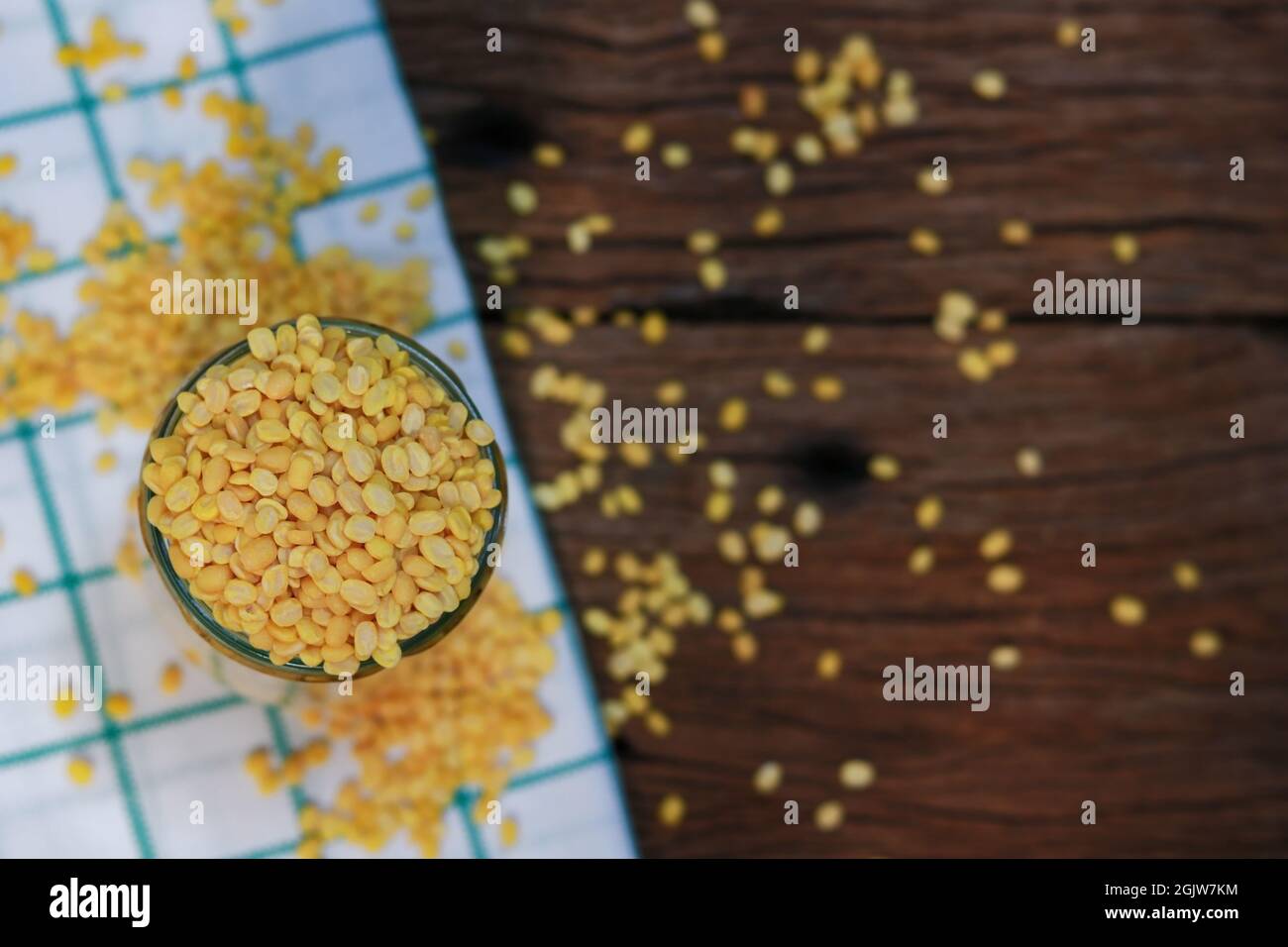Peeled split soy bean on wood background Stock Photo - Alamy