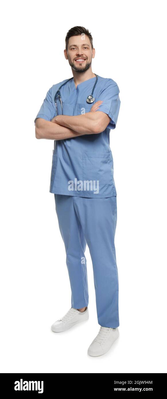 Handsome surgeon standing on white background Stock Photo - Alamy