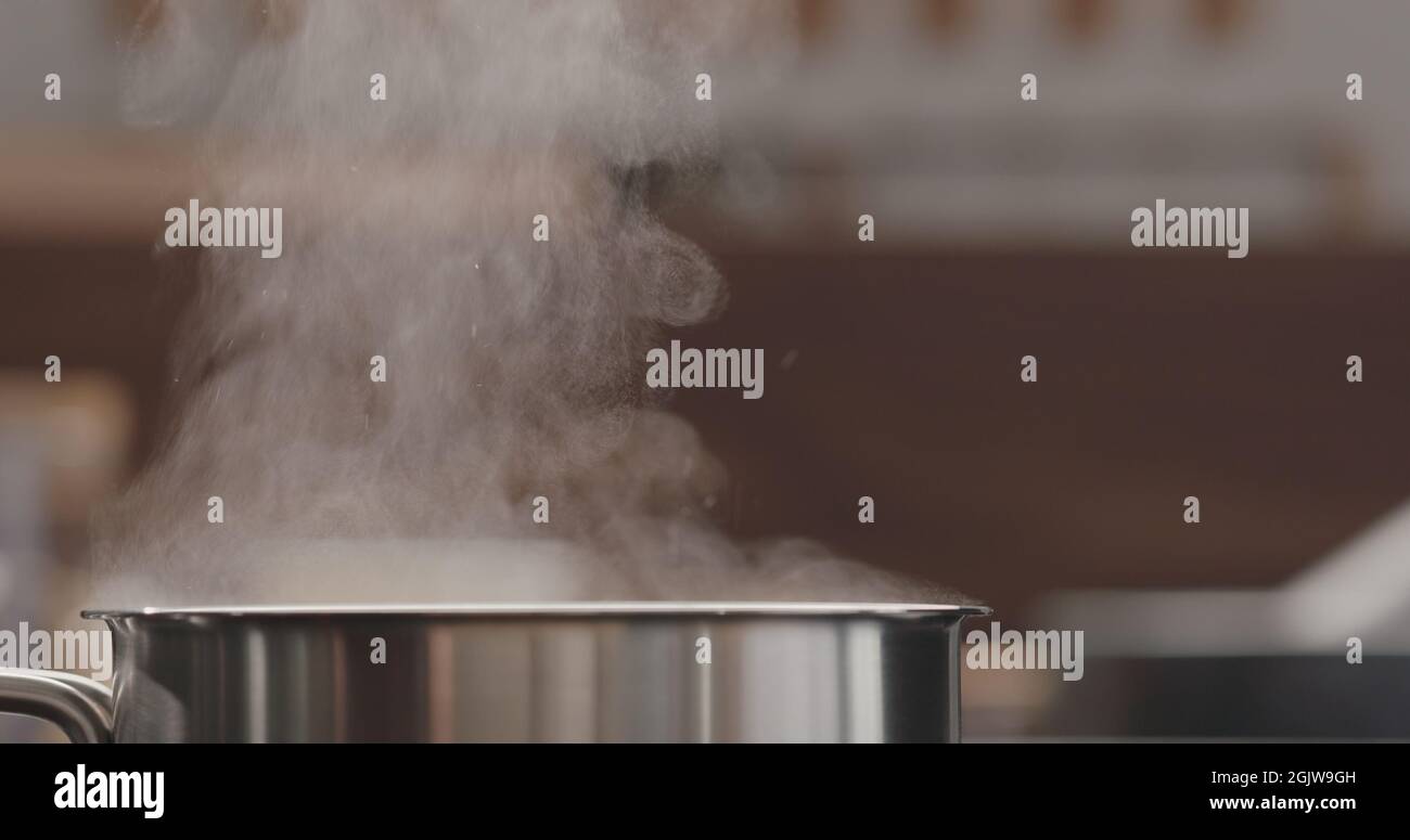 Steam rising from boiling pot hi-res stock photography and images - Alamy