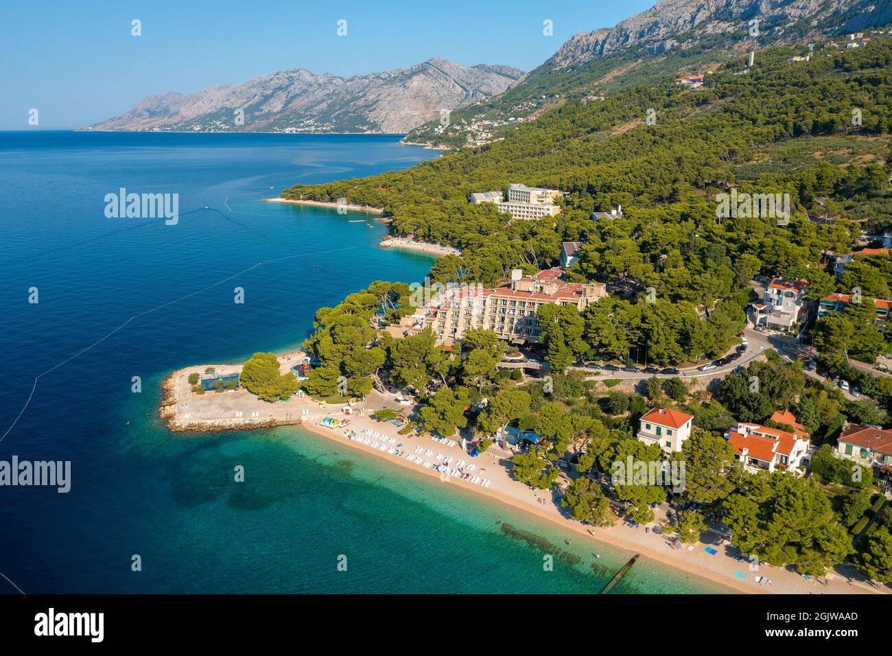 Aerial view of Brela town below Biokovo mountain, the Adriatic Sea ...