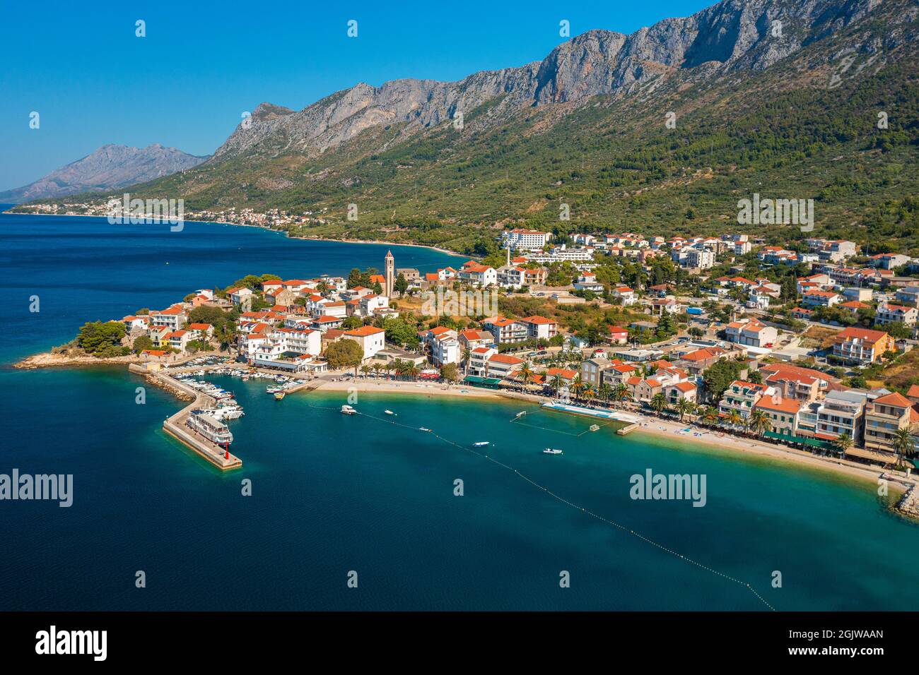 Aerial view of Gradac town below Biokovo mountain, the Adriatic Sea ...