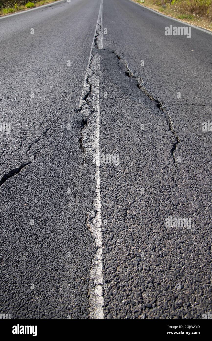 Close up of asphalt road surface crack Stock Photo - Alamy
