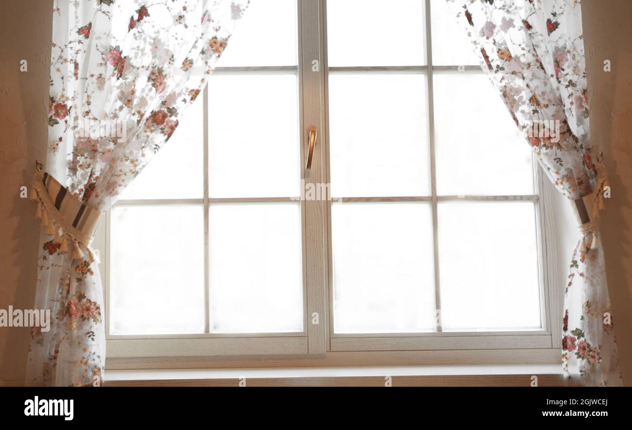 Large wooden window with beautiful curtains in sunny day Stock Photo ...