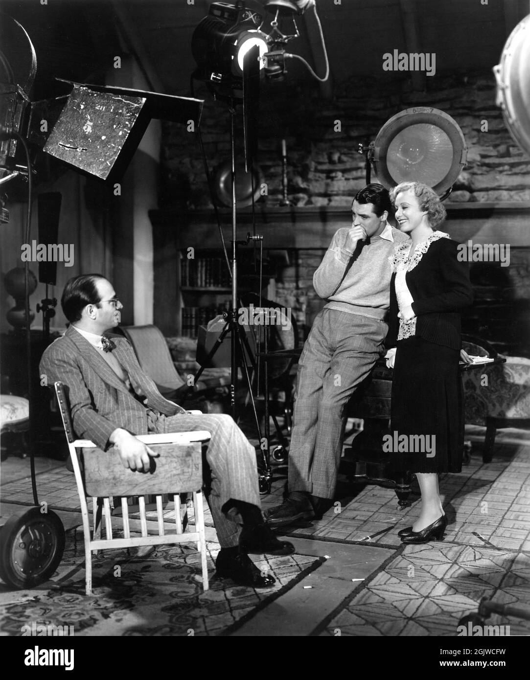 Co-Director / Writer ROBERT RISKIN CARY GRANT and GRACE MOORE on set ...
