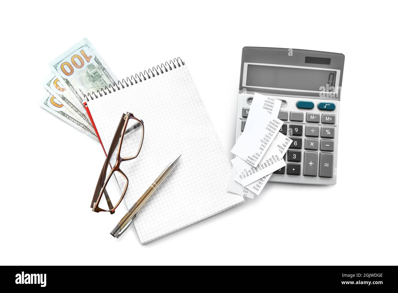 Gray calculator and notebook on white background Stock Photo - Alamy