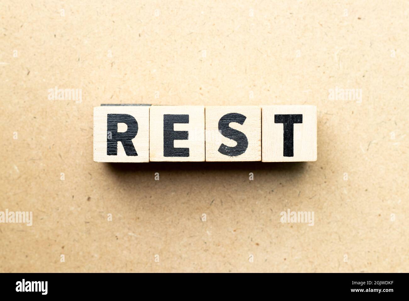 Alphabet letter block in word rest on wood background Stock Photo - Alamy
