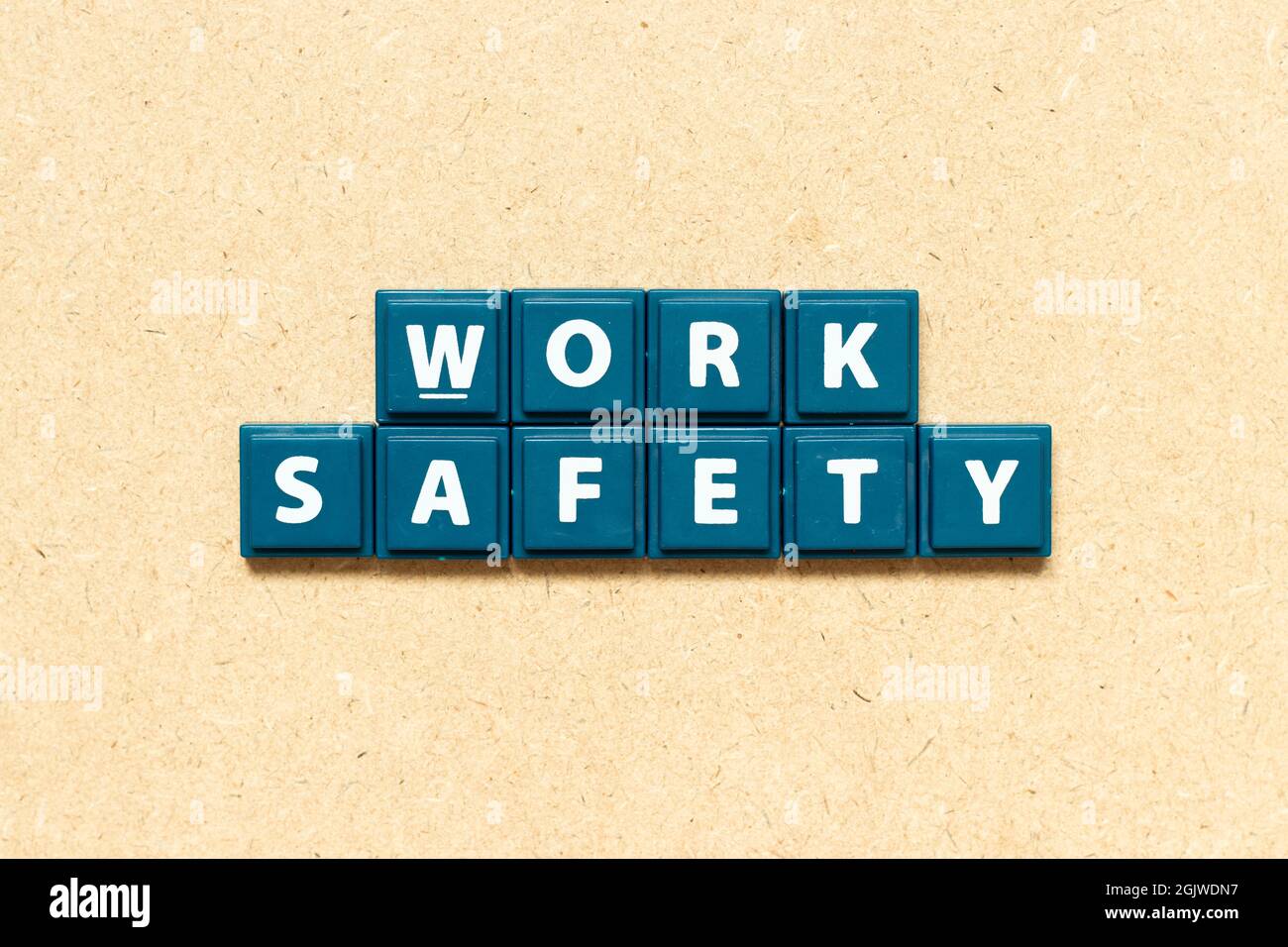 Tile alphabet letter in word work safety on wood background Stock Photo ...