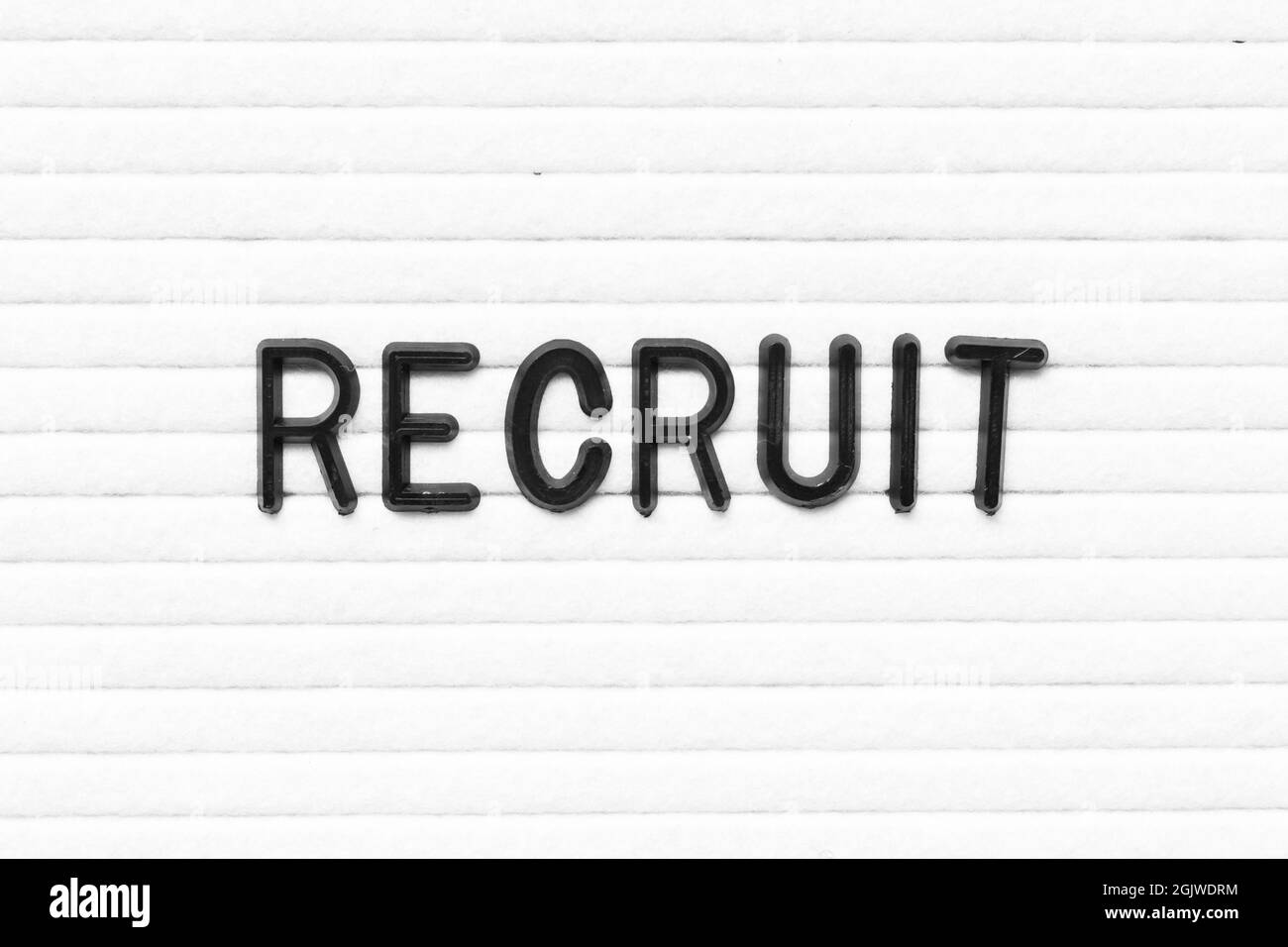 Black letter in word recruit on white felt board background Stock Photo ...
