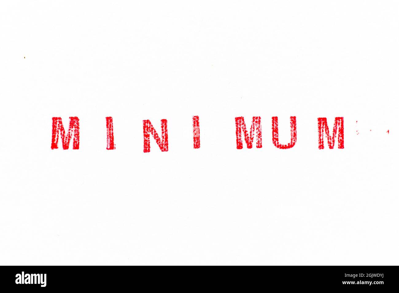 Red color rubber stamp in word minimum on white paper background Stock ...