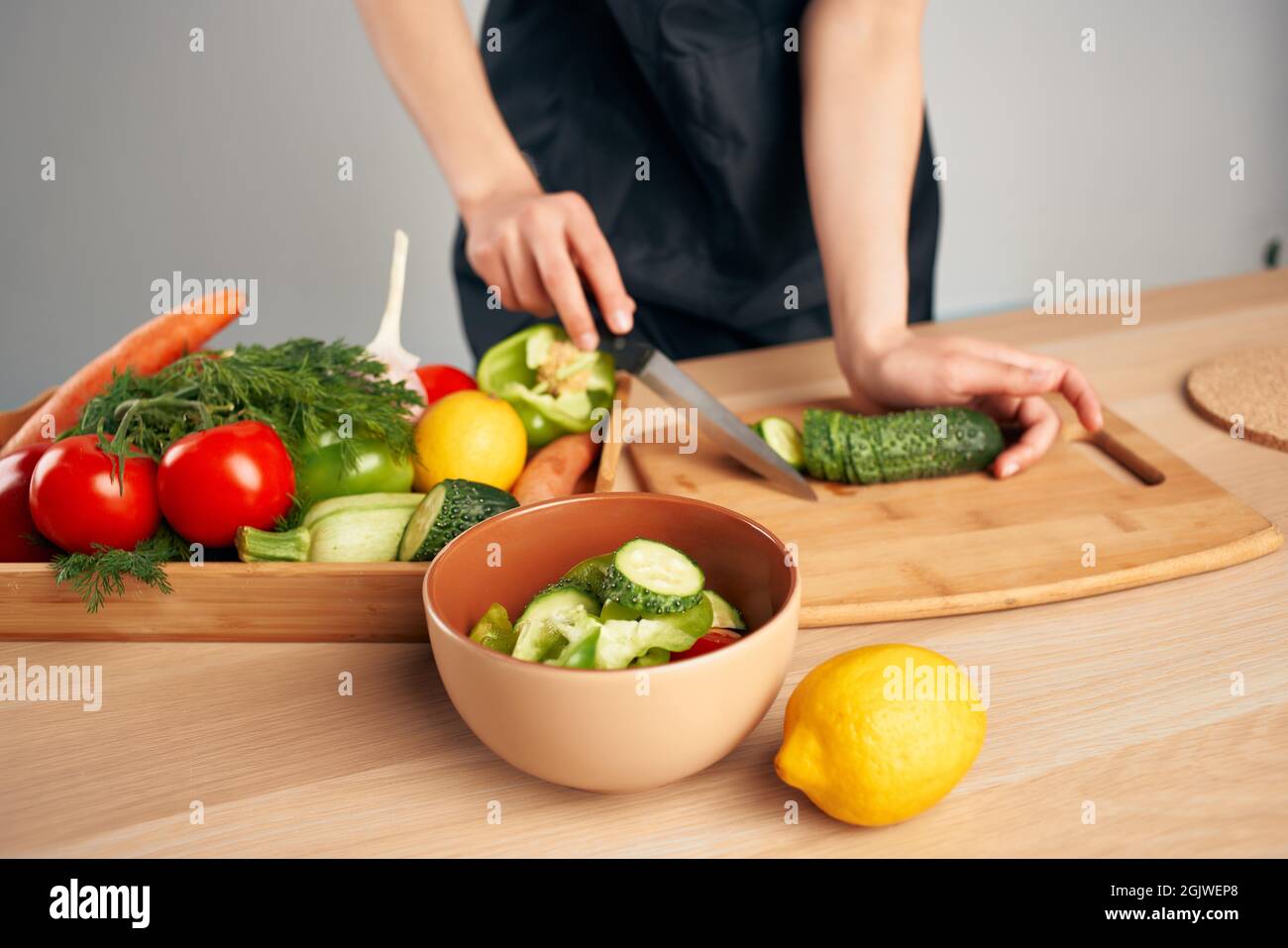 chef in the kitchen cutting vegetables vitamins housework Stock Photo ...
