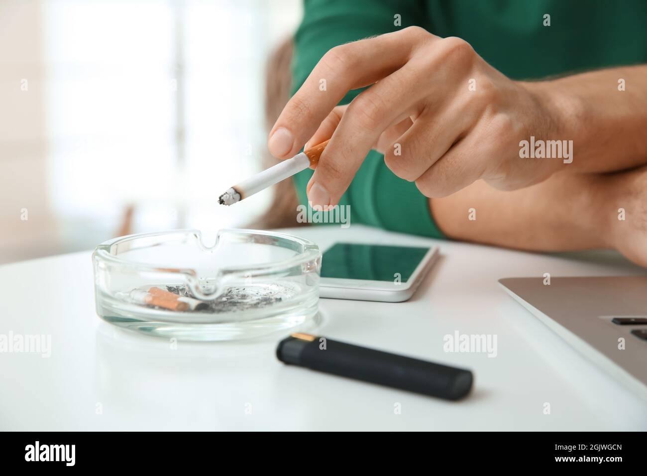 Cigar lighter ashtray man hi-res stock photography and images - Alamy