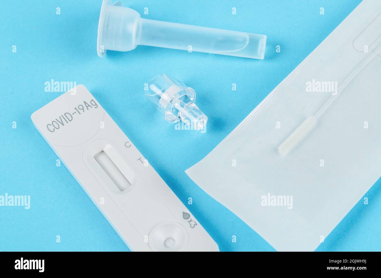 Rapid kits of Covid-19 Ag test seen on blue background Stock Photo - Alamy