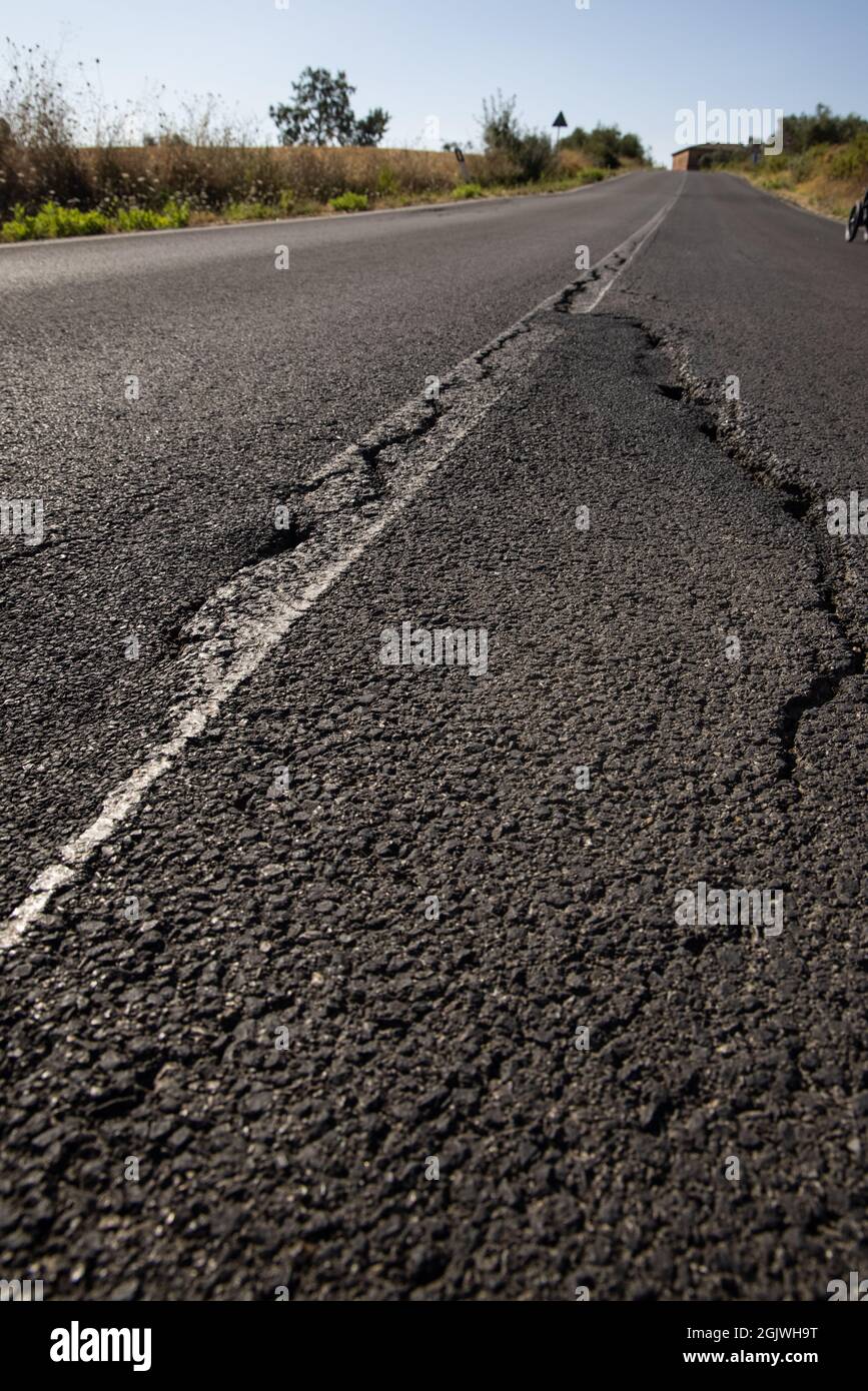 Close up of asphalt road surface crack Stock Photo - Alamy
