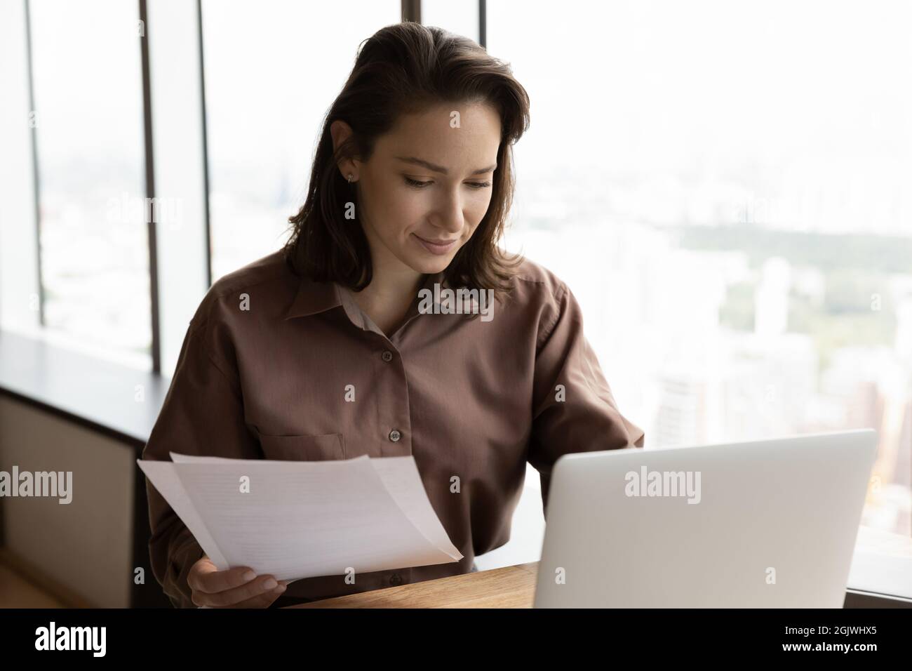 Female post employee hi-res stock photography and images - Alamy