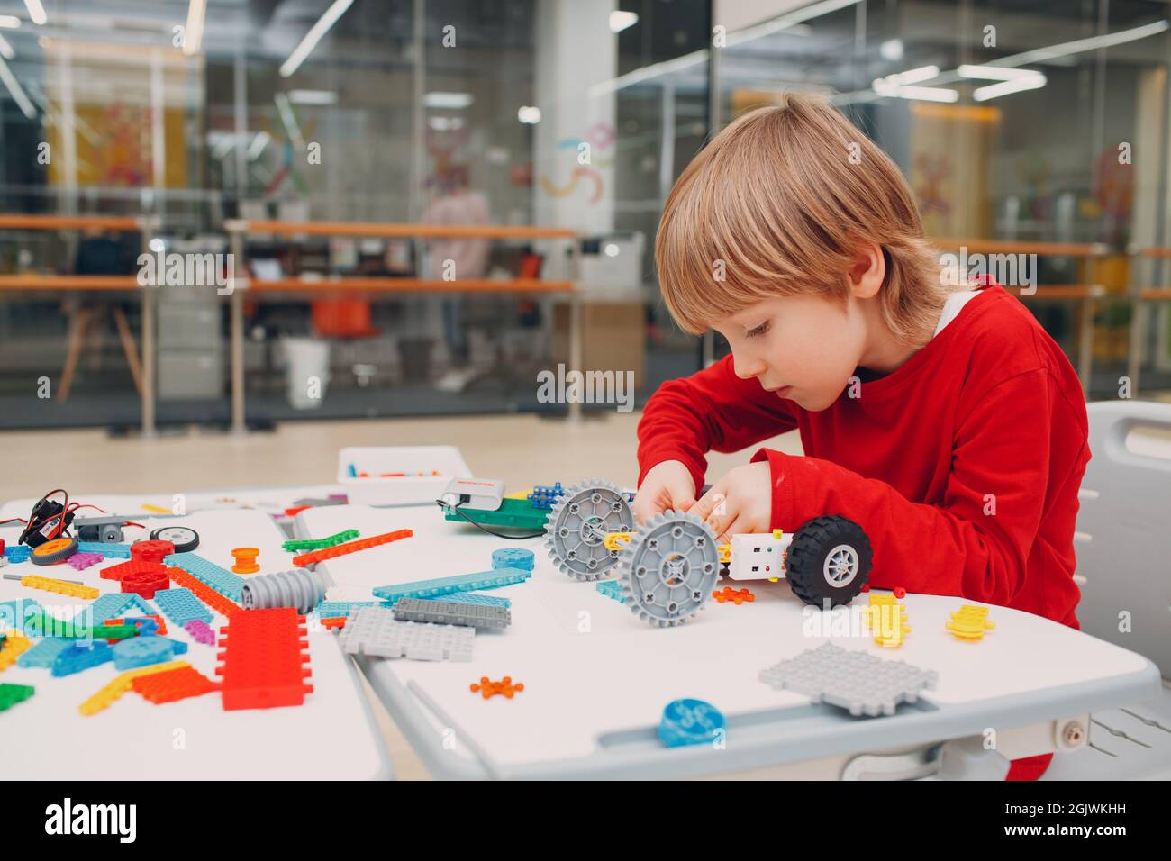 Little boy kid child constructor checking technical toy. Children ...