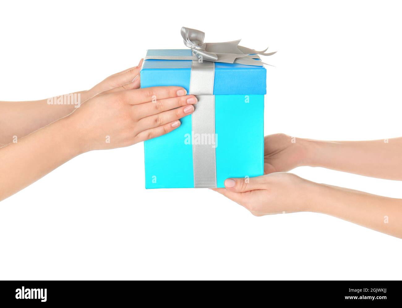 Hands giving and receiving gift box on white background Stock Photo - Alamy