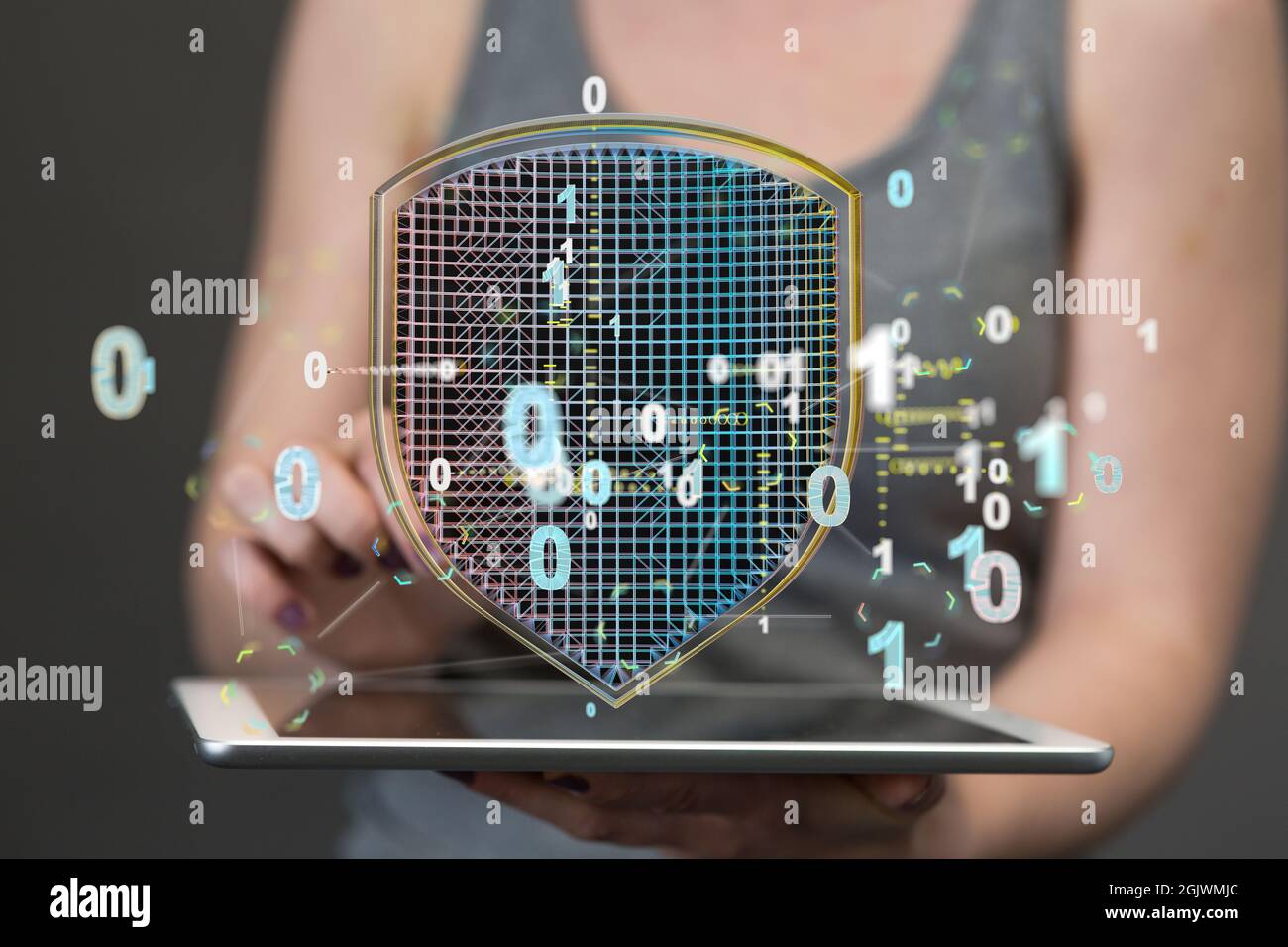 A digital cyber security shield and numbers above a tablet Stock Photo ...