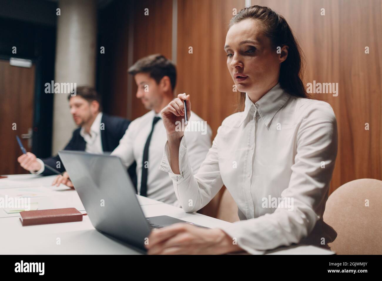 Businesswoman team at office meeting. Business people group conference ...