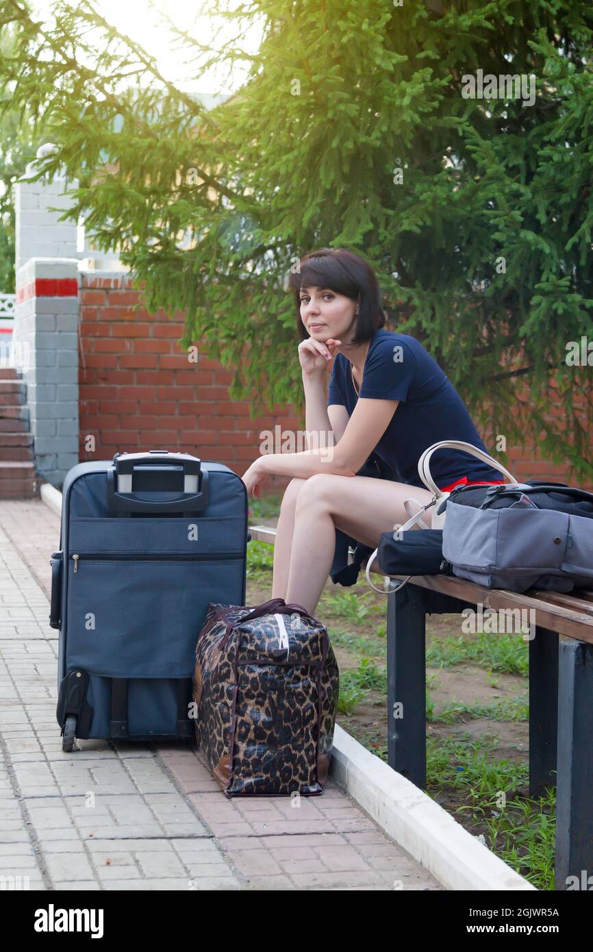 Bored at a bus station hi-res stock photography and images - Alamy