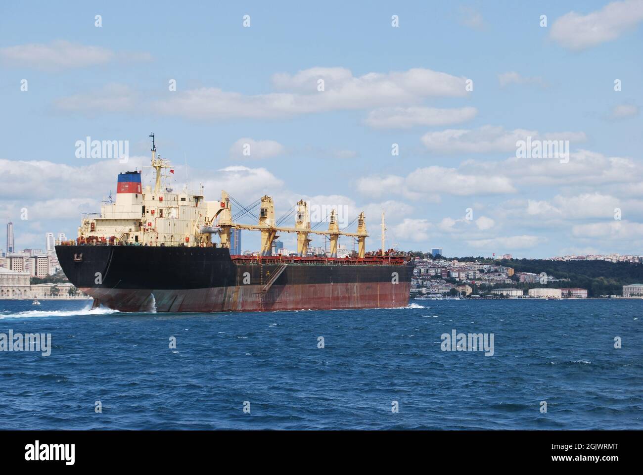 Large cargo ship, cargo ship carrying containers, engaged in ...