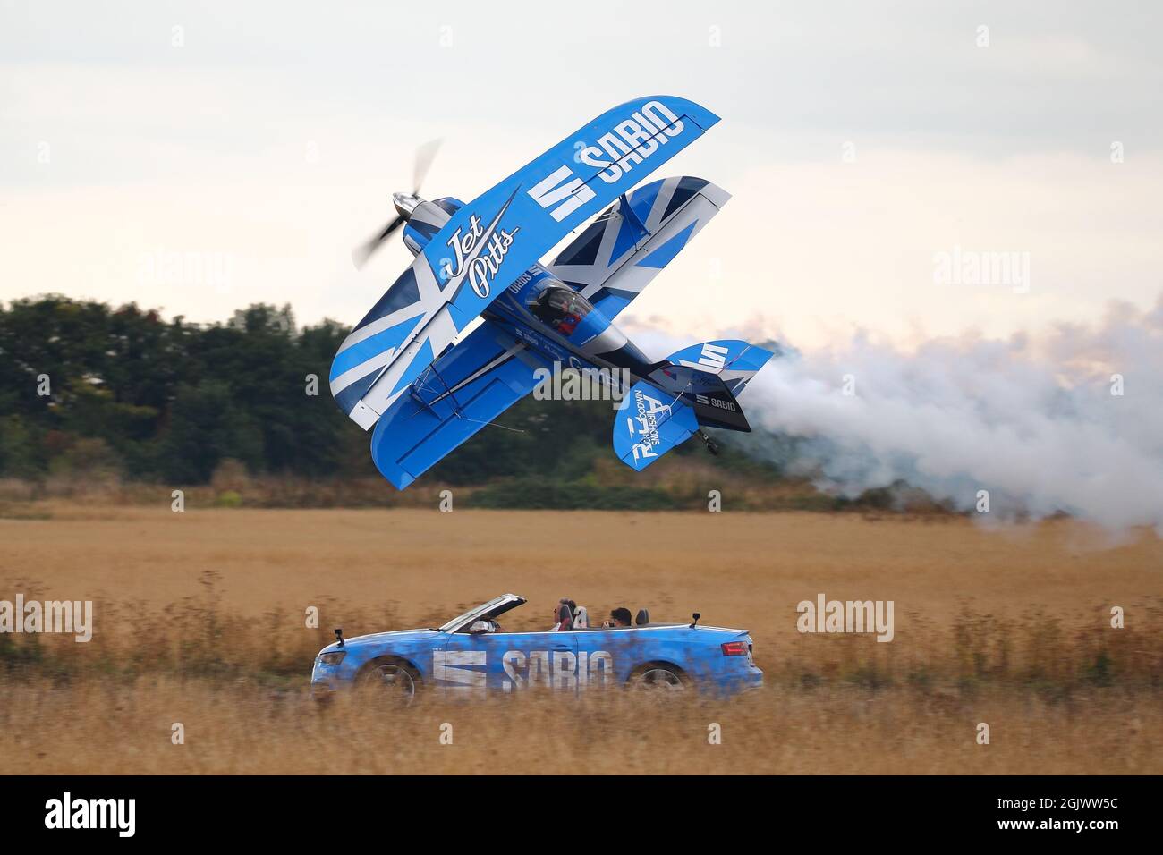 Rich Goodwin flying his blue Pitts Special biplane G-JPIT in a knife ...