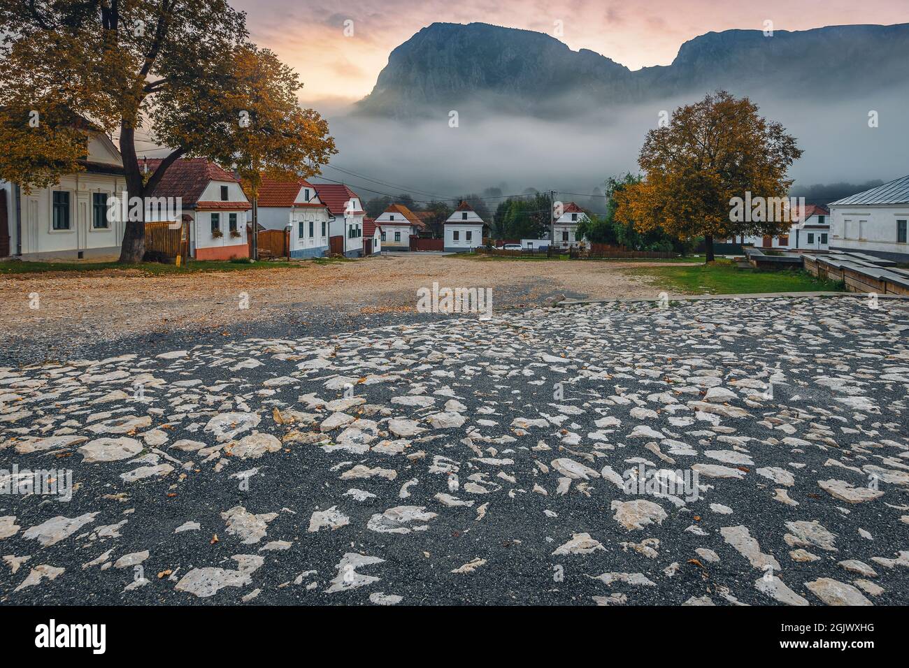 Amazing rural street view with traditional whitewashed houses in row at ...