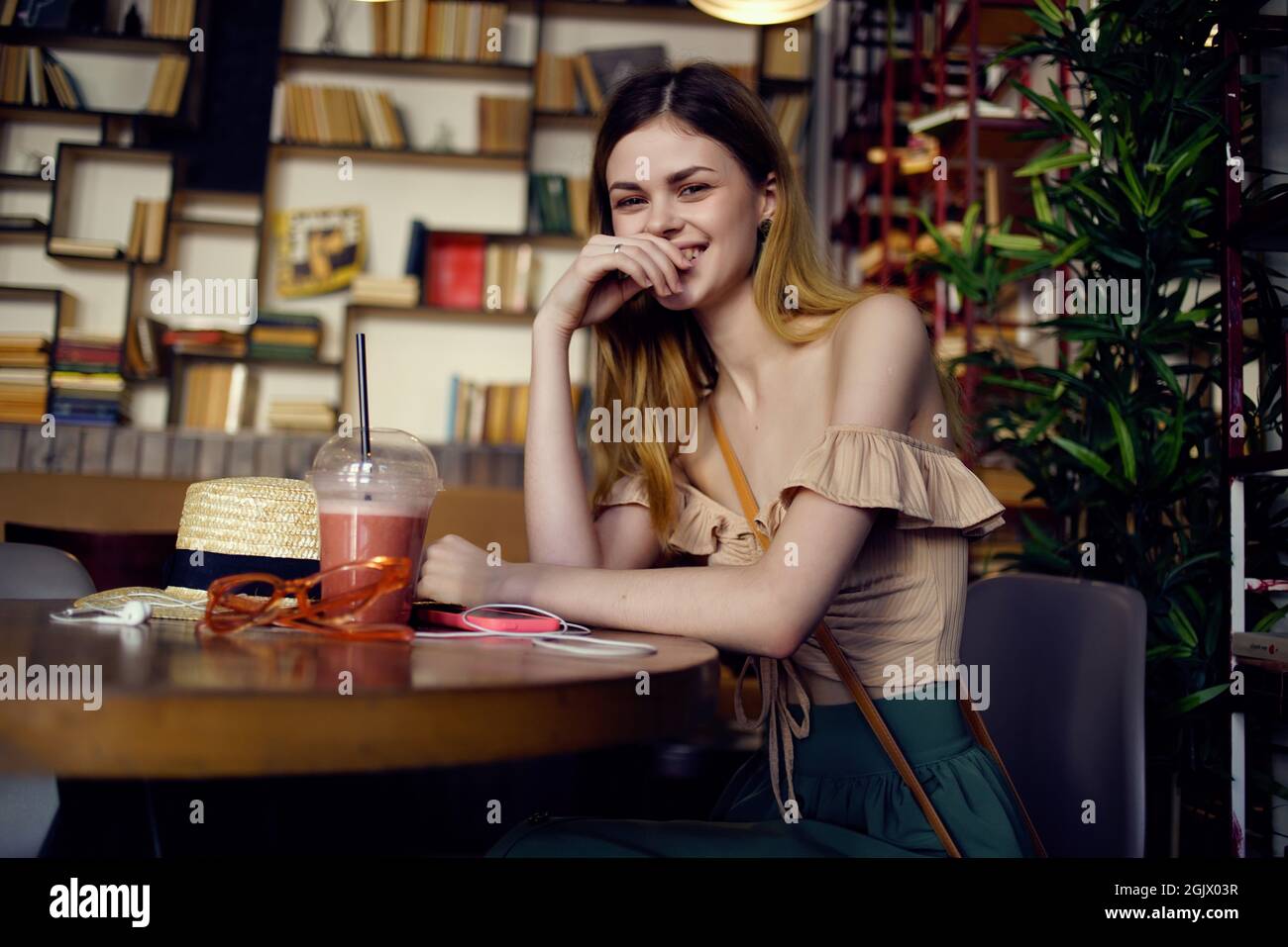 beautiful woman reading a book in a cafe Lifestyle Stock Photo - Alamy