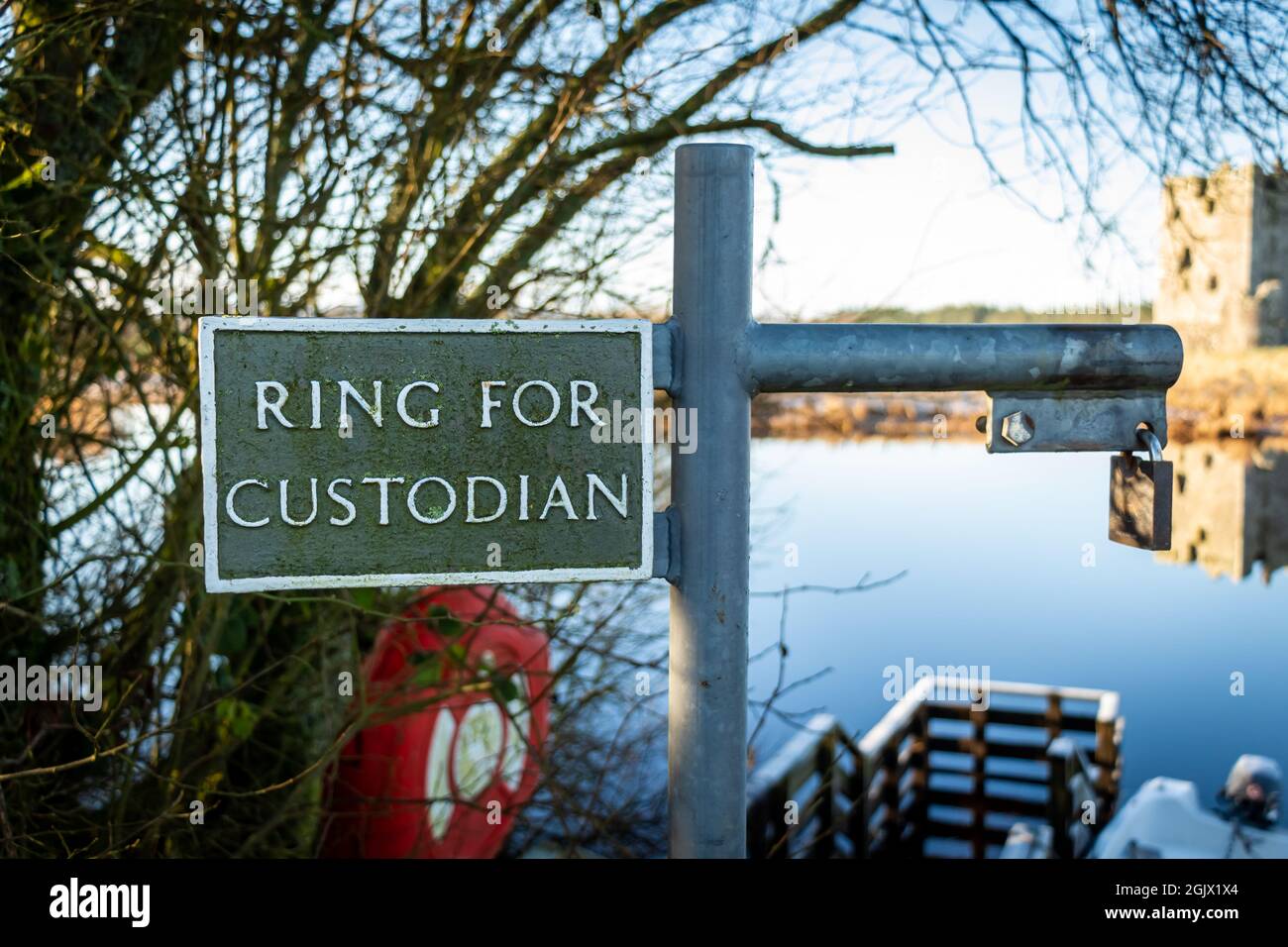 Ring for the custodian sign at the Threave Castle ferry crossing on the ...